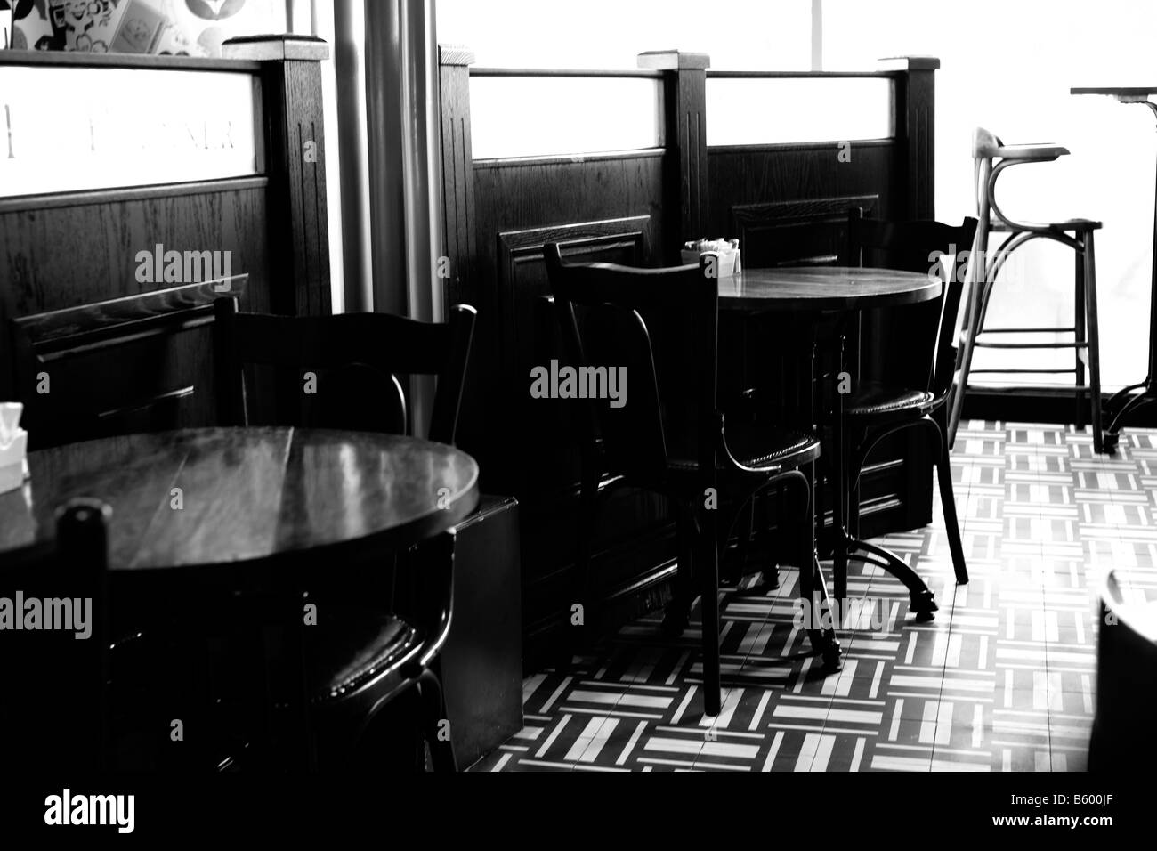 Restaurant tables chairs in Black and White Stock Photos & Images - Alamy