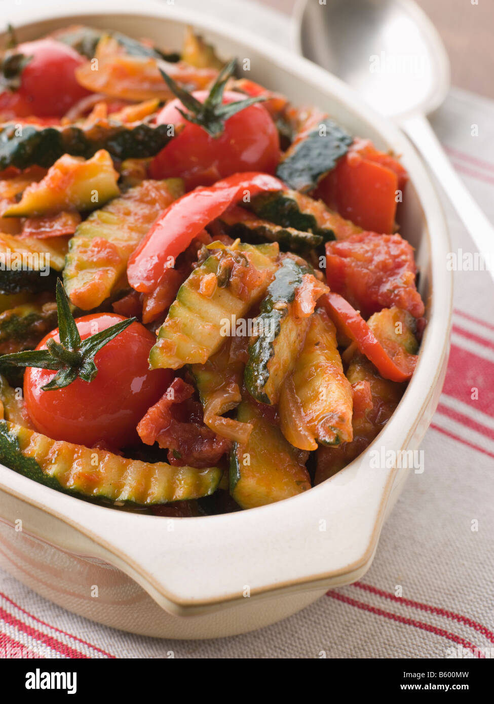 Dish of Provencale Courgettes Stock Photo - Alamy