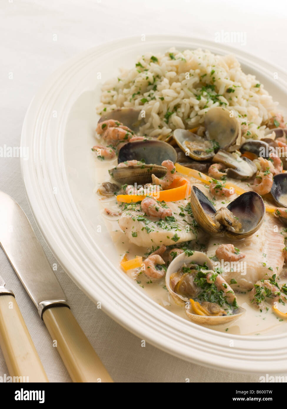 Dover Sole 'Normande' with Herb Rice Stock Photo - Alamy