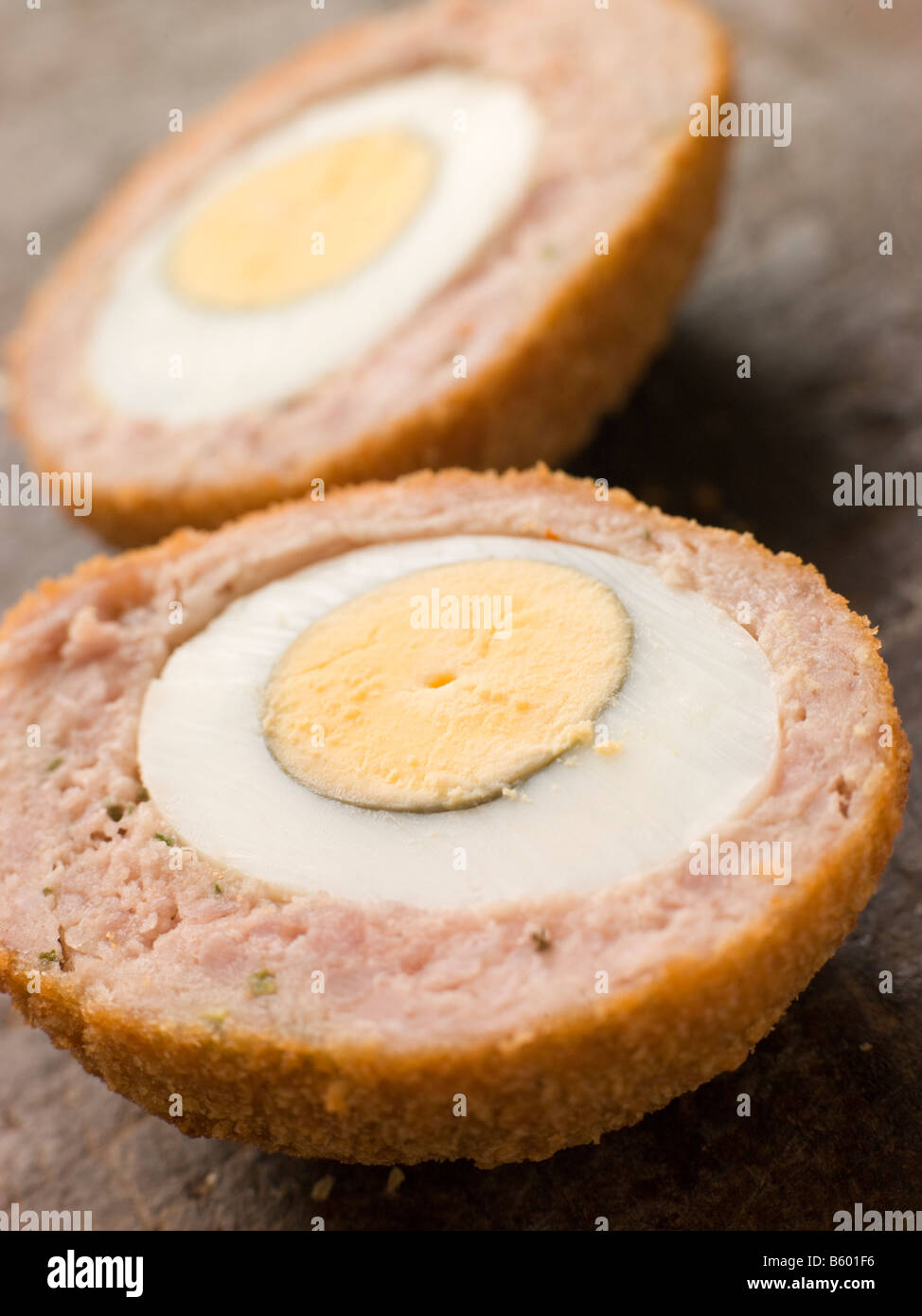 Scotch Egg cut in half Stock Photo - Alamy