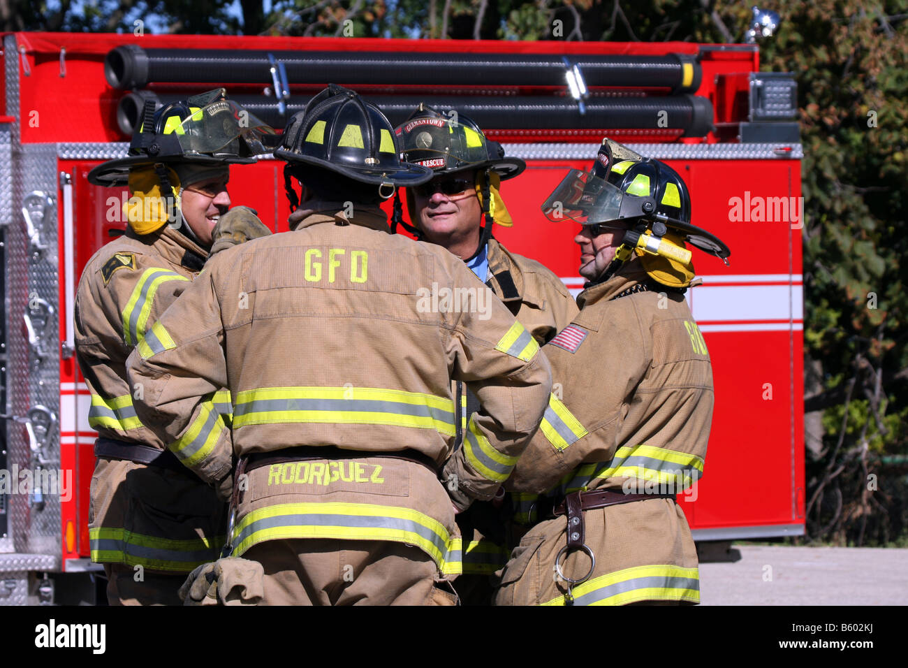 Firefighter talking community hi-res stock photography and images - Alamy