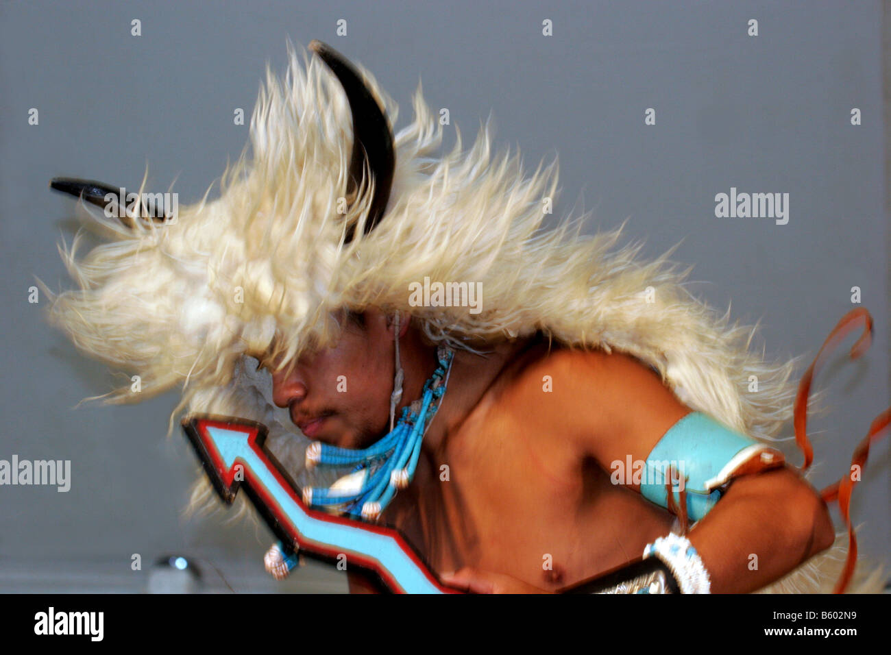 Young Zuni man demonstrating the Buffalo dance during folk festival ...