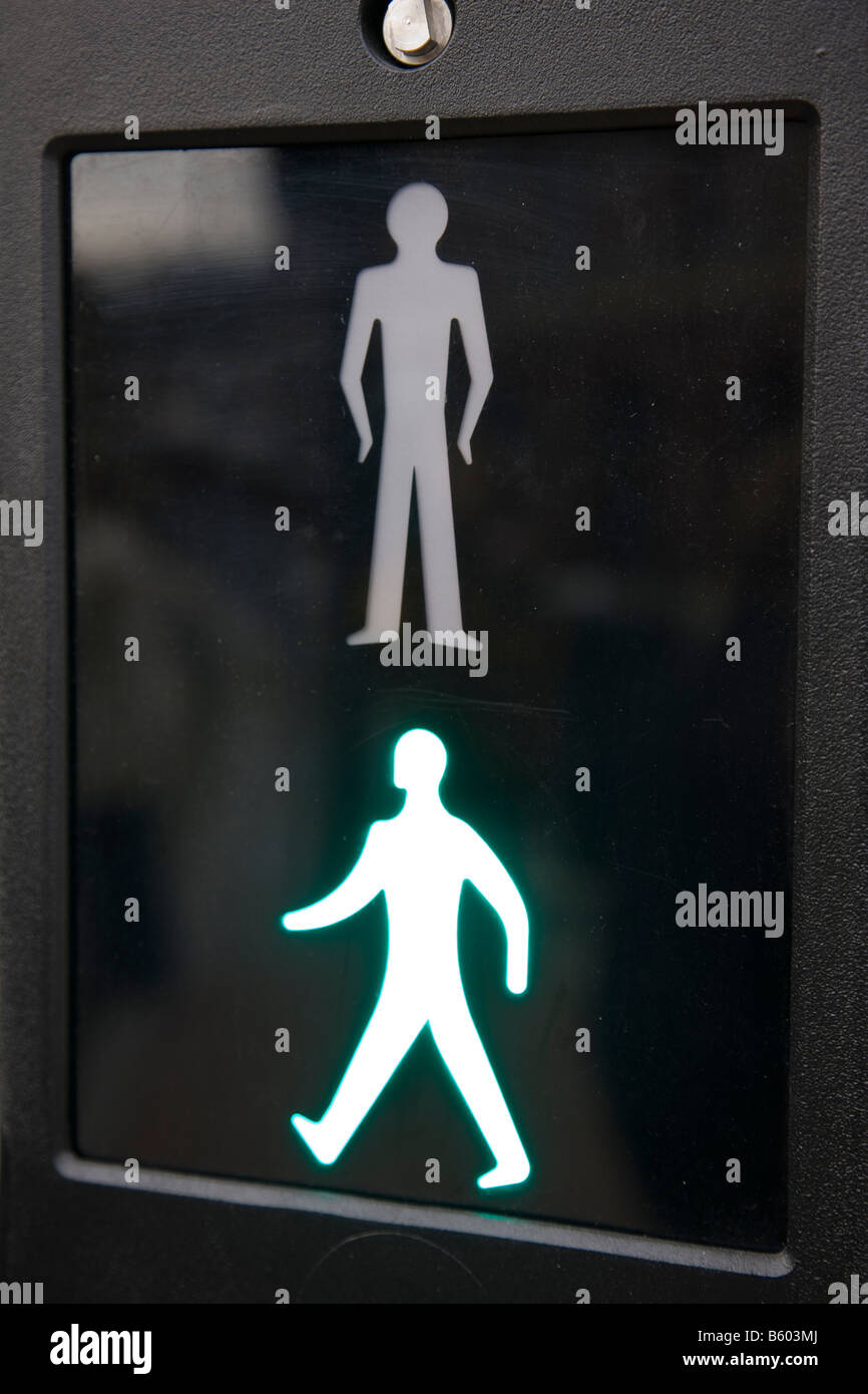 A pedestrian crossing showing the green 'go' sign, Guildford, Surrey ...