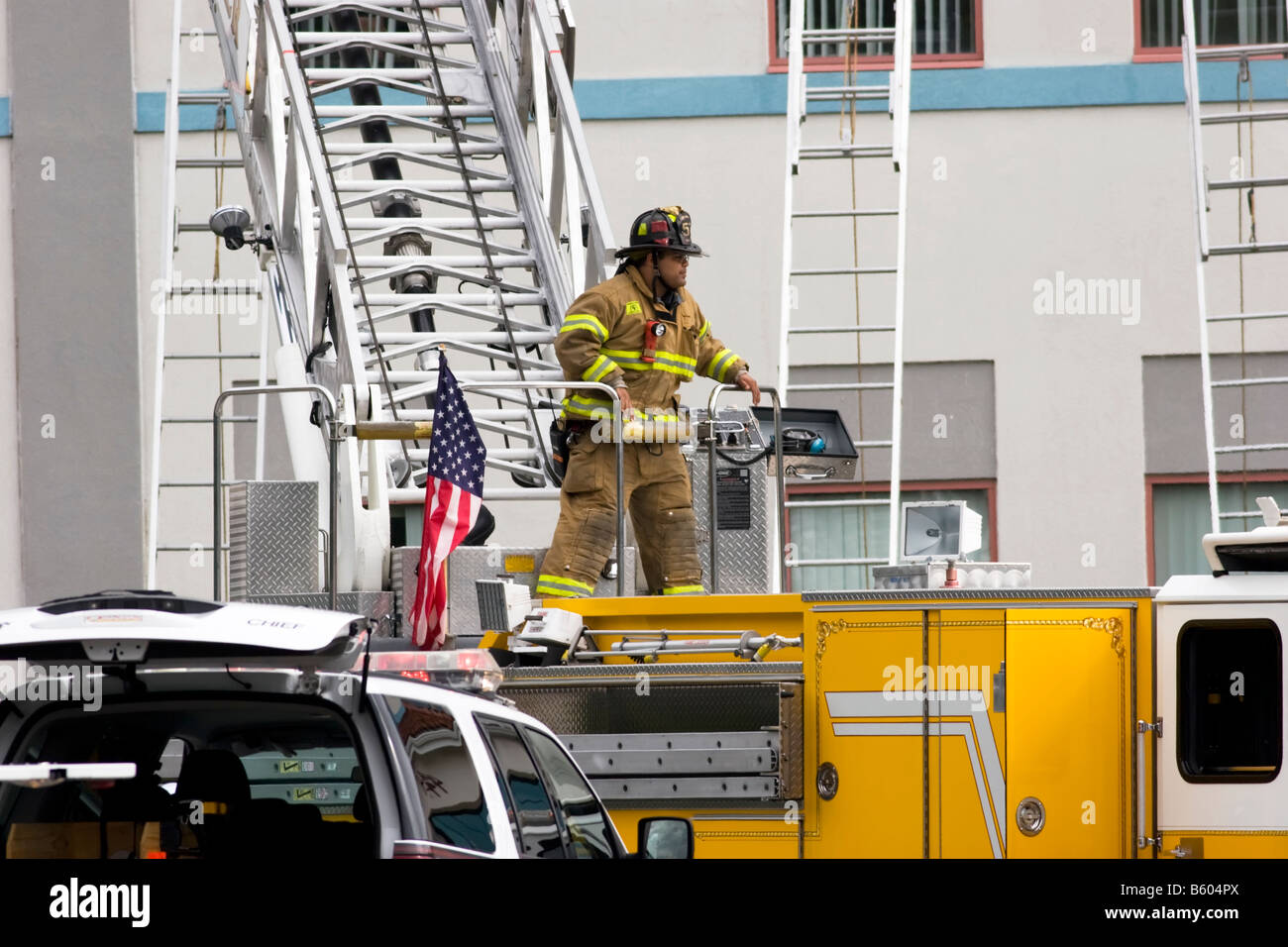 fireman on truck Stock Photo - Alamy