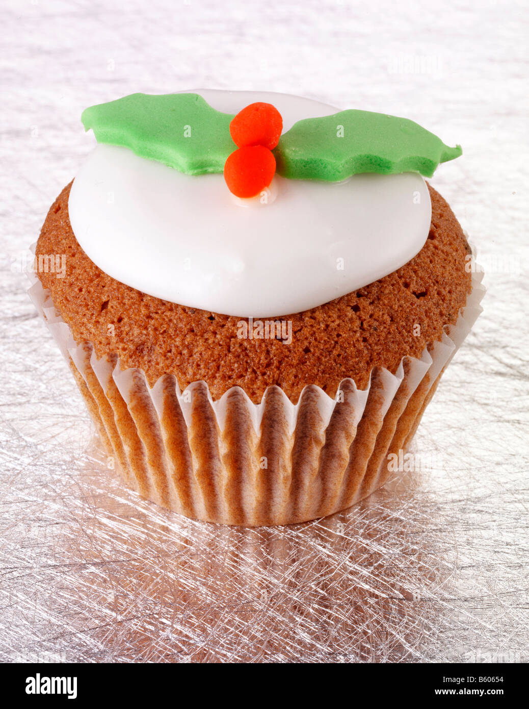 CHRISTMAS HOLLY CUPCAKE Stock Photo - Alamy