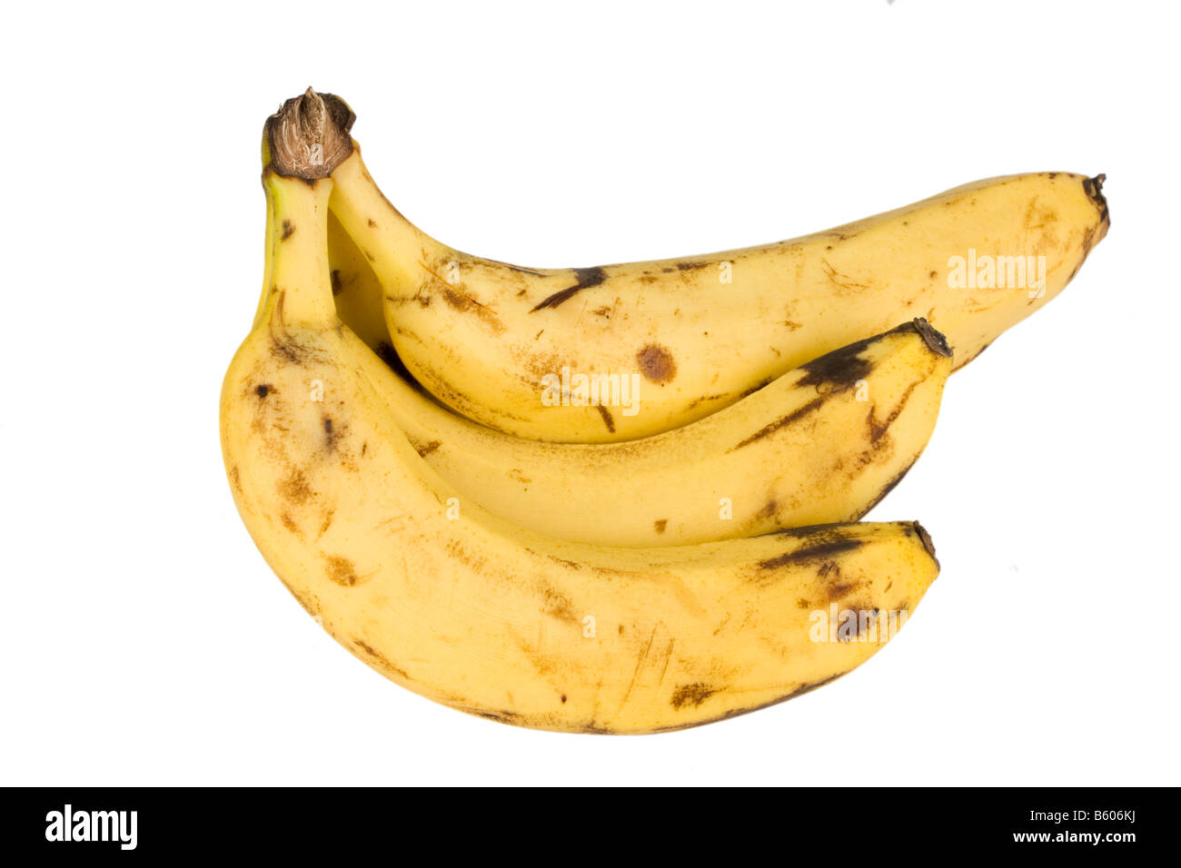 three ripe bananas on white background Stock Photo - Alamy
