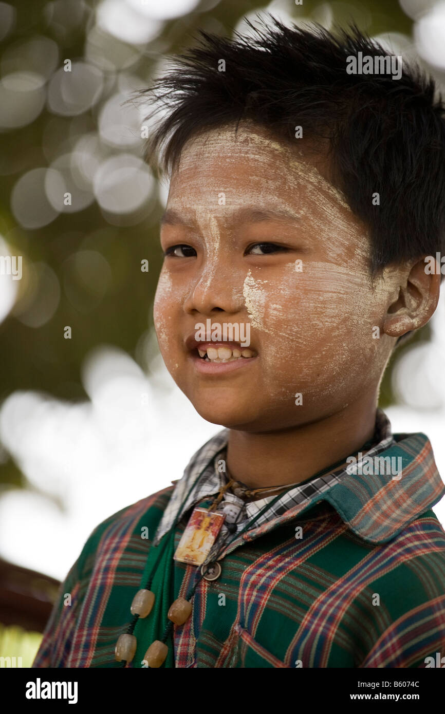 Boy in Mandalay with tanaka powder, Myanmar, Burma Stock Photo - Alamy