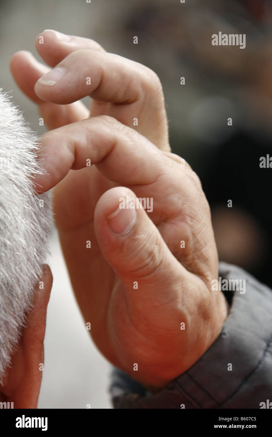 Man scratching back head watching hi-res stock photography and images ...