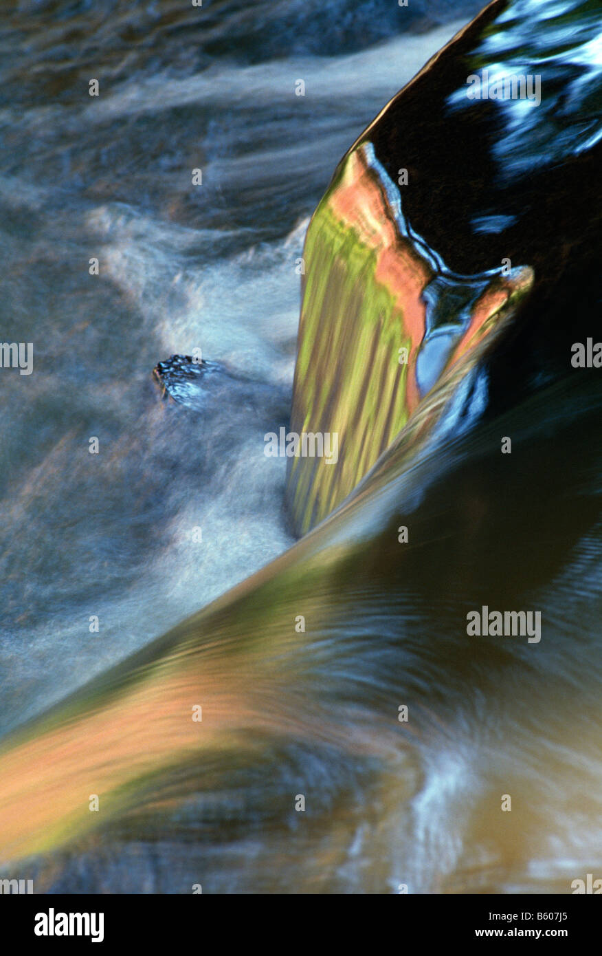 Colorful reflection of the red Pine Valley Covered Bridge in the falls ...