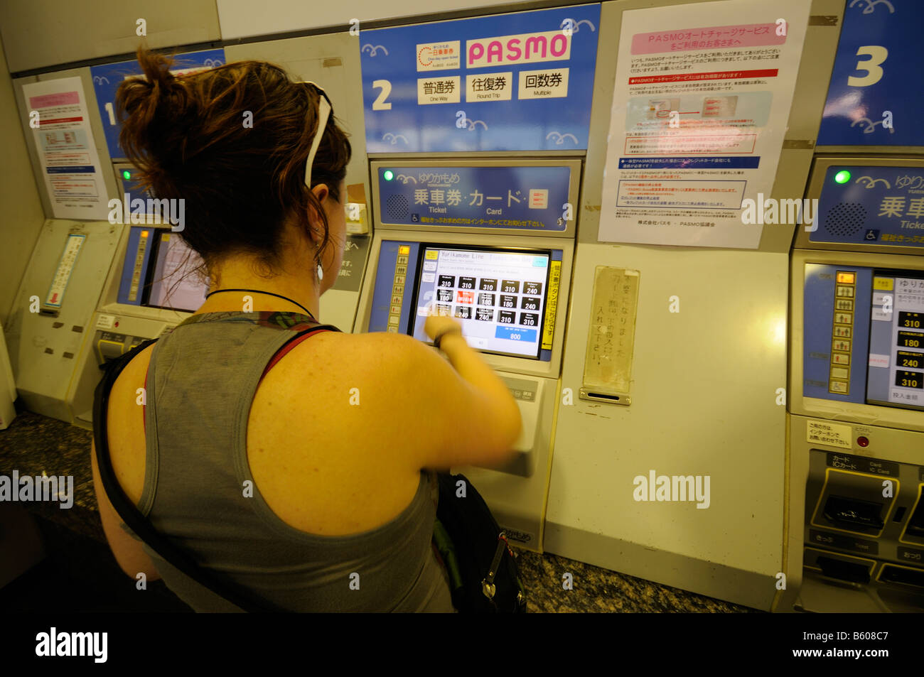 Buying tickets for Automated guideway transit train (Yurikamome Line ...