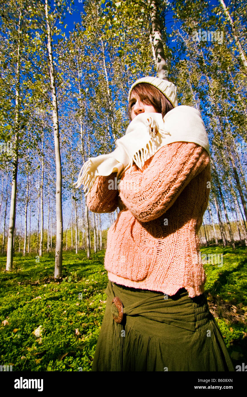 Young woman ready for a cold day in the forest Stock Photo - Alamy
