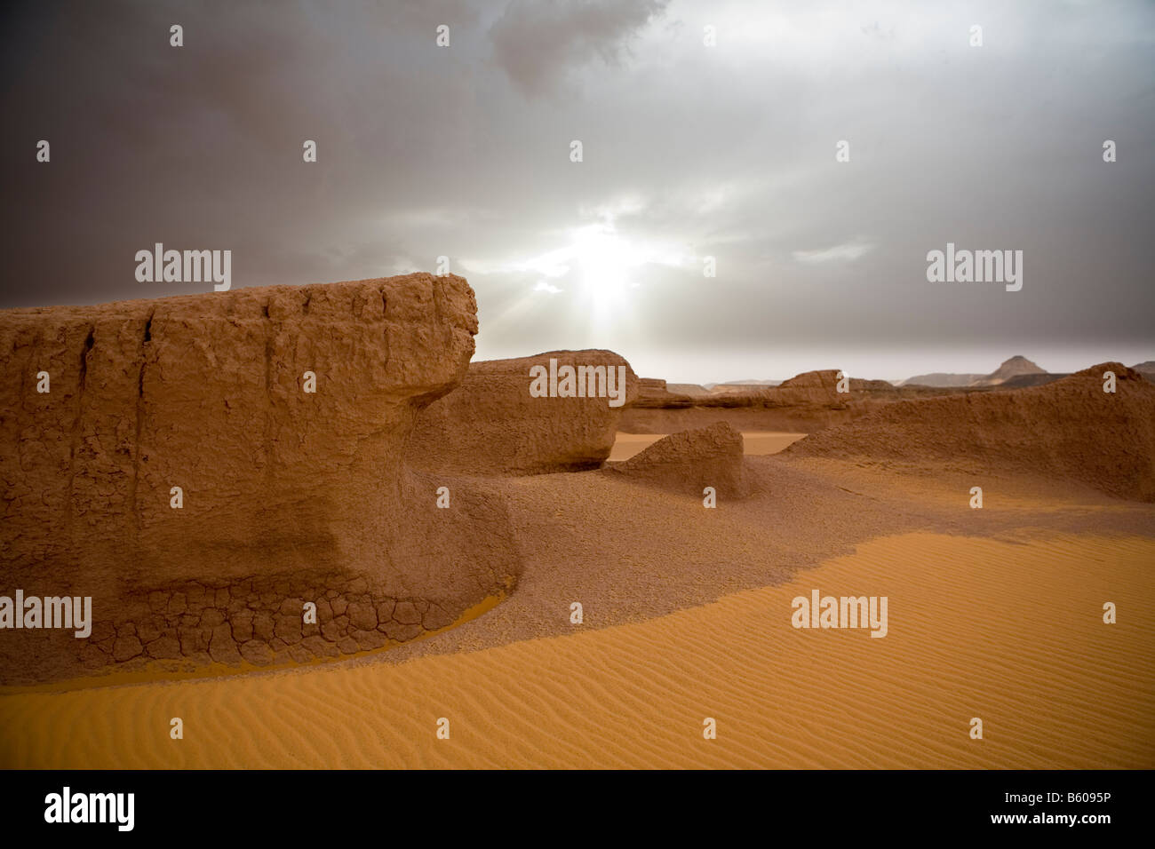 Yardang field in stormy skies, Gilf Kebir , Egypt , Africa Stock Photo ...