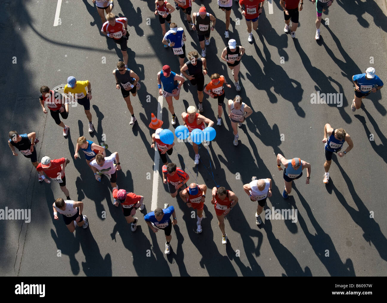 Marathon Runners seen from above Stock Photo - Alamy