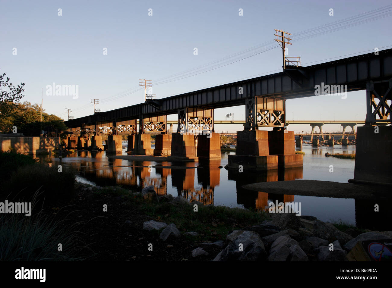 Railroad crossing the James river on massive concrete pylons Stock ...