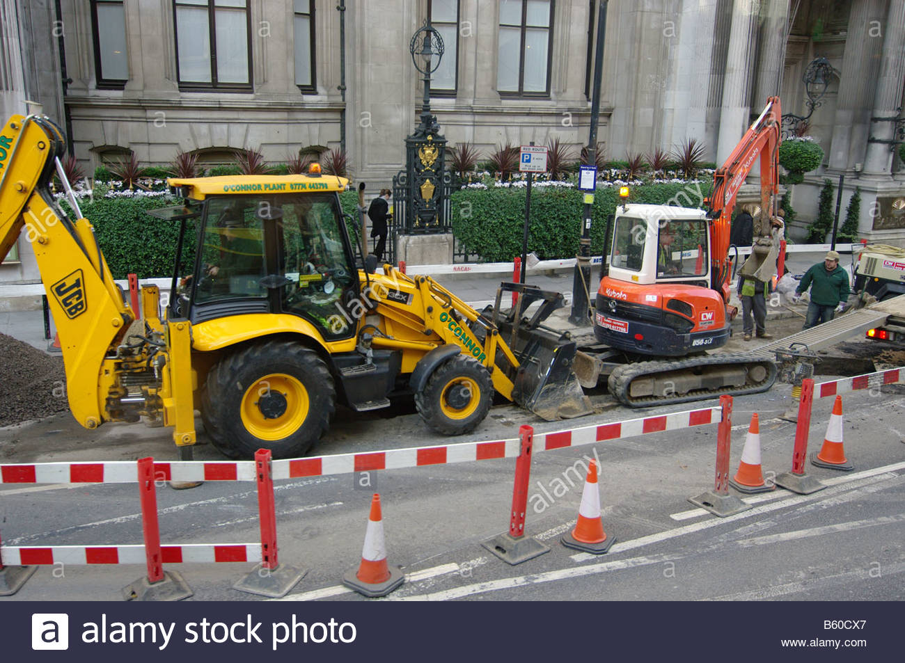 Man Digging Hole In Road High Resolution Stock Photography and Images ...
