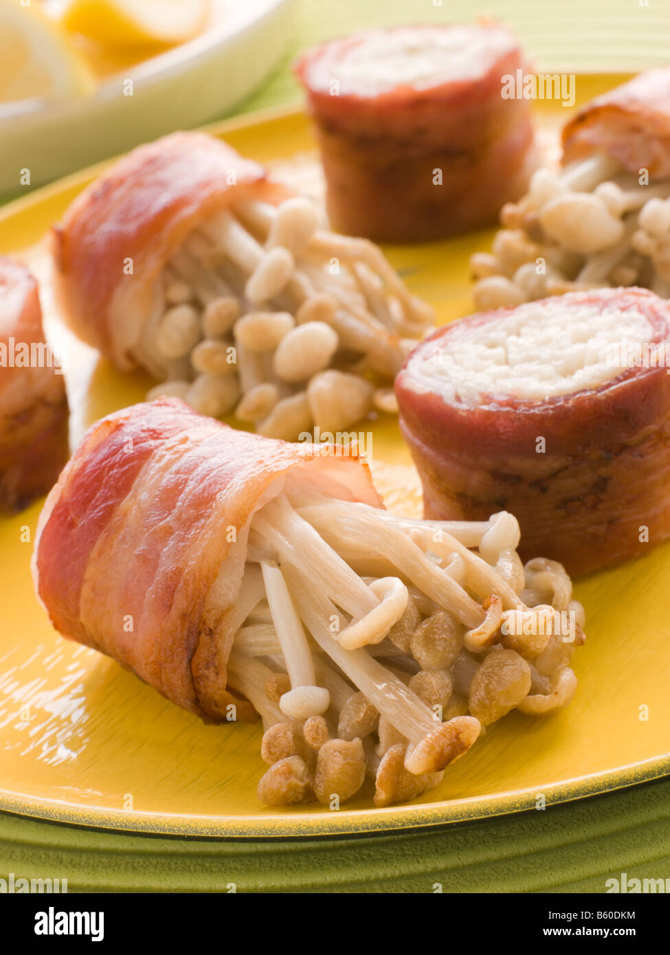 Enoki Mushrooms wrapped in Smoked Bacon Stock Photo - Alamy