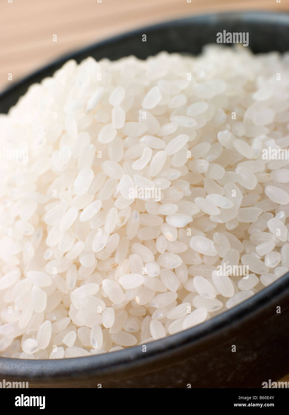 Bowl of Uncooked Sushi Rice Stock Photo - Alamy