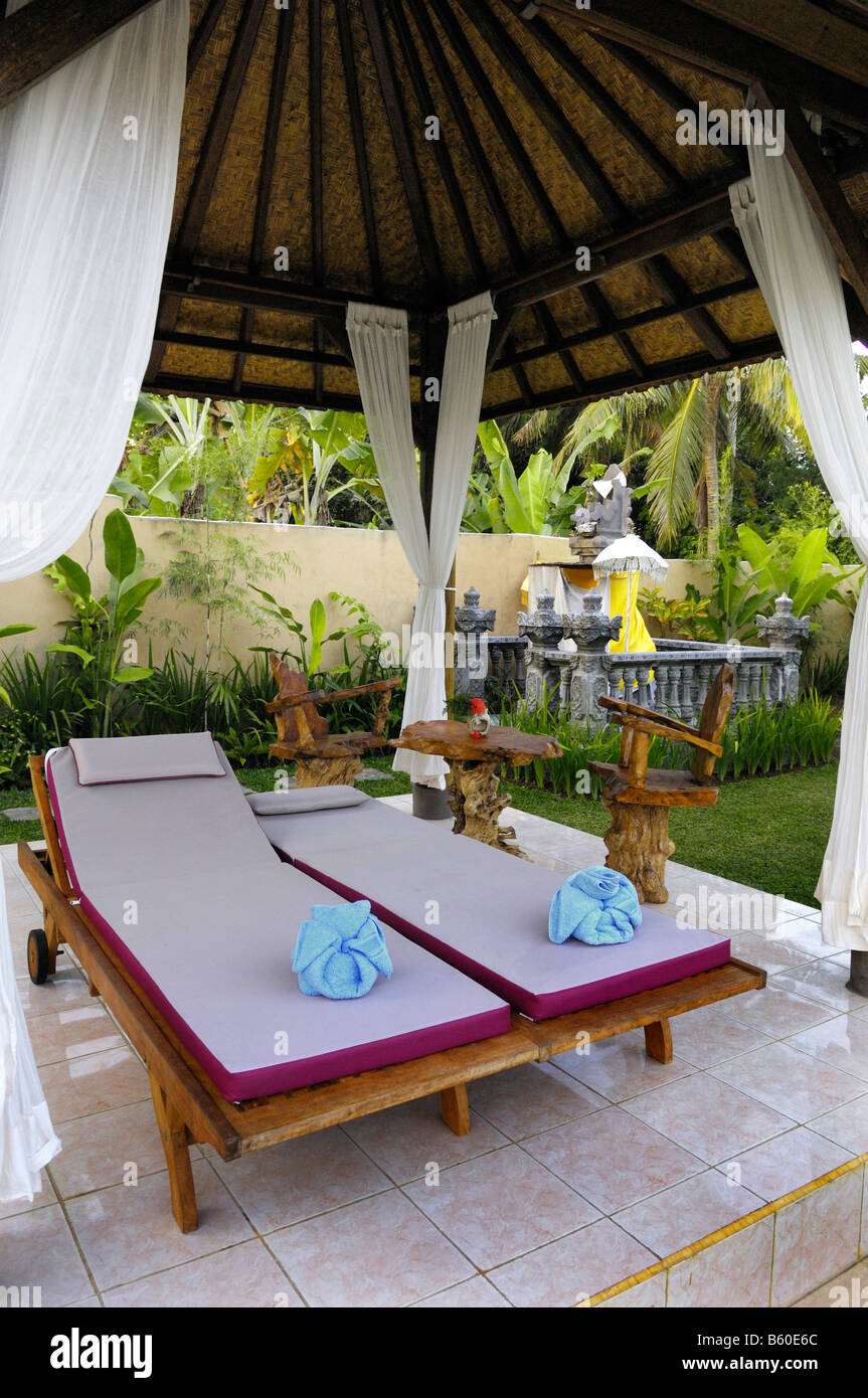 Recliner chairs in a resort near Saba, Bali, Indonesia Stock Photo - Alamy