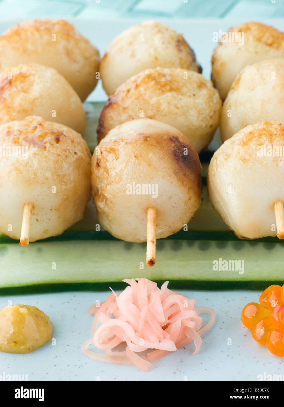 Fish Ball Skewers With Cucumber Salad Stock Photo - Alamy