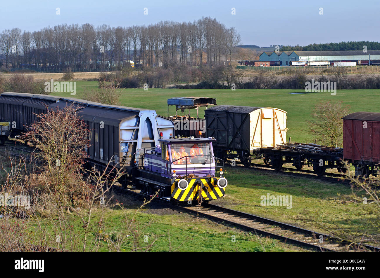 Internal locomotive moving stored railway rolling stock at former army ...