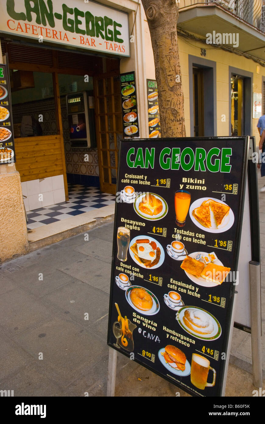 Restaurant advertising its fare with a picture menu in Barceloneta ...