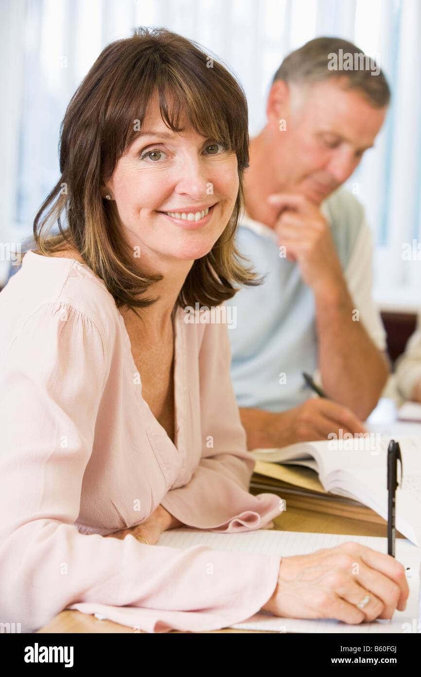 Two female students taking notes hi-res stock photography and images ...