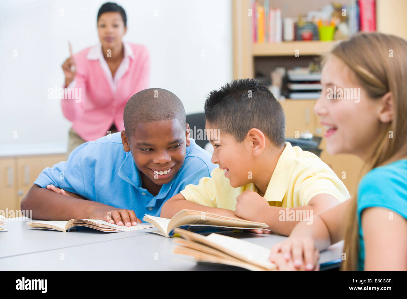 Two Students Talking In Class
