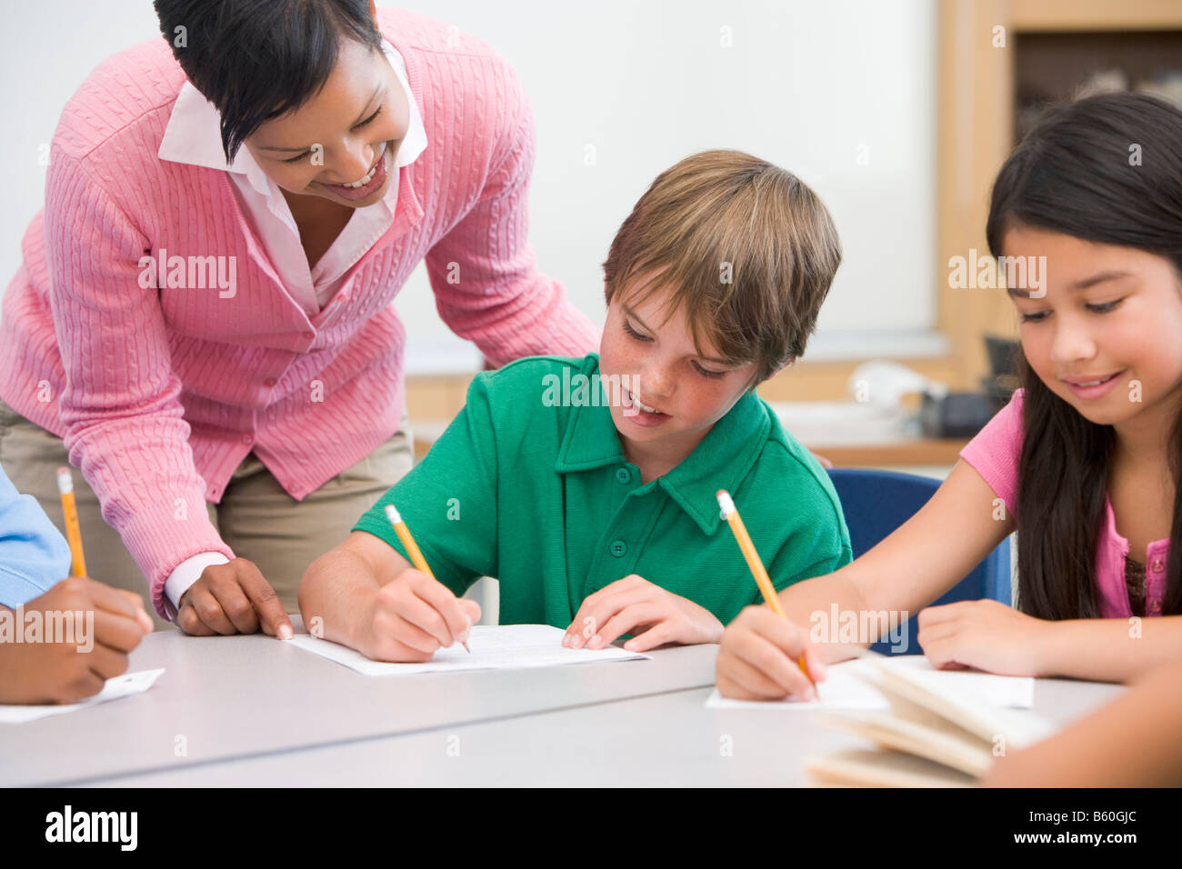 Pre teen writing in class hi-res stock photography and images - Alamy