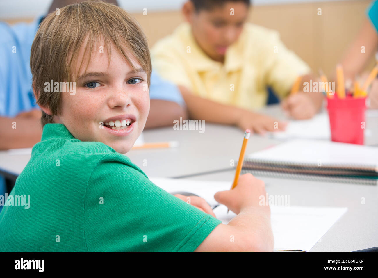 Pre teen writing in class hi-res stock photography and images - Alamy