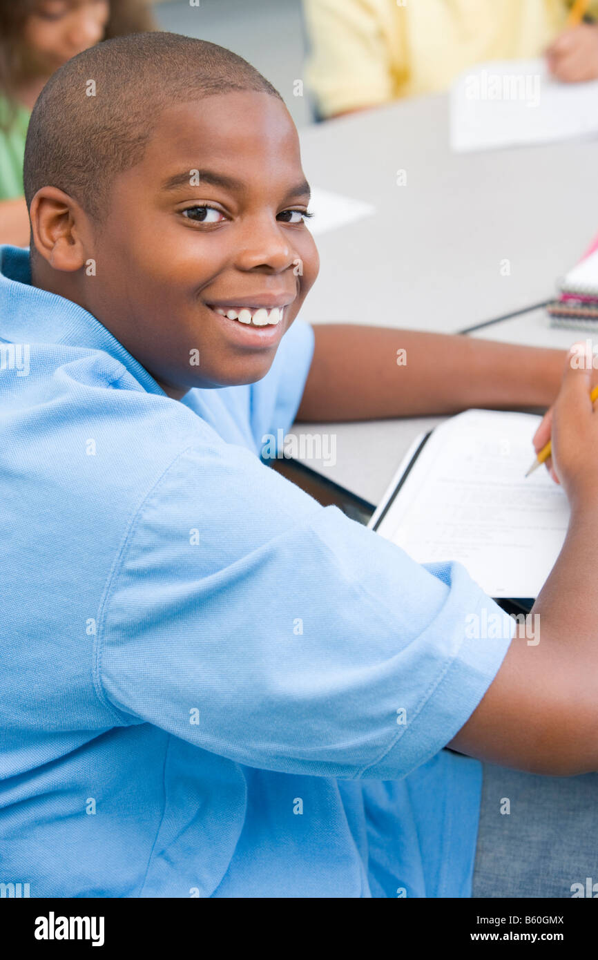 African american teen boy writing hi-res stock photography and images ...