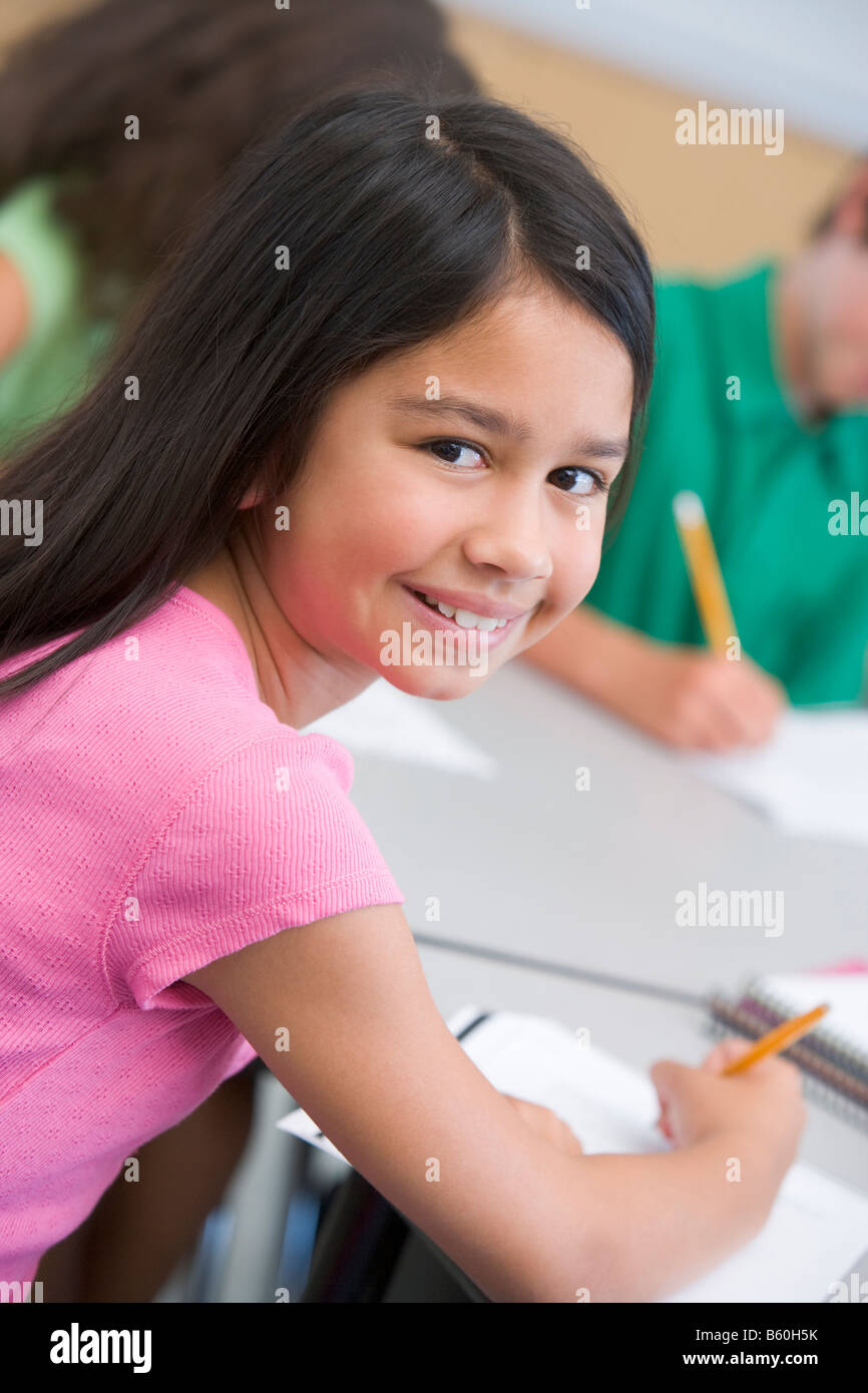 Student in class looking at camera (selective focus Stock Photo - Alamy