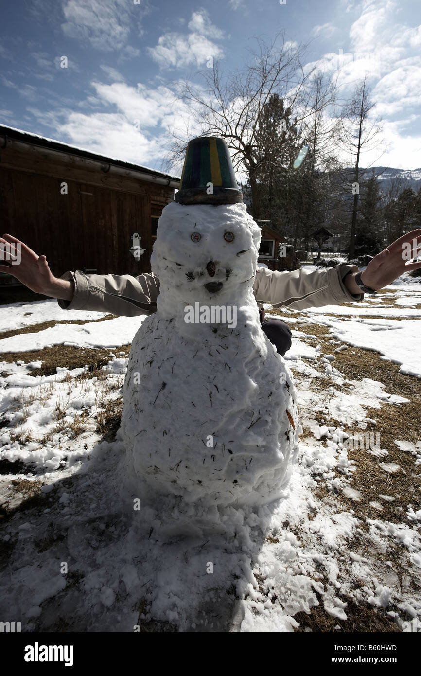 Snowman with arms Stock Photo - Alamy