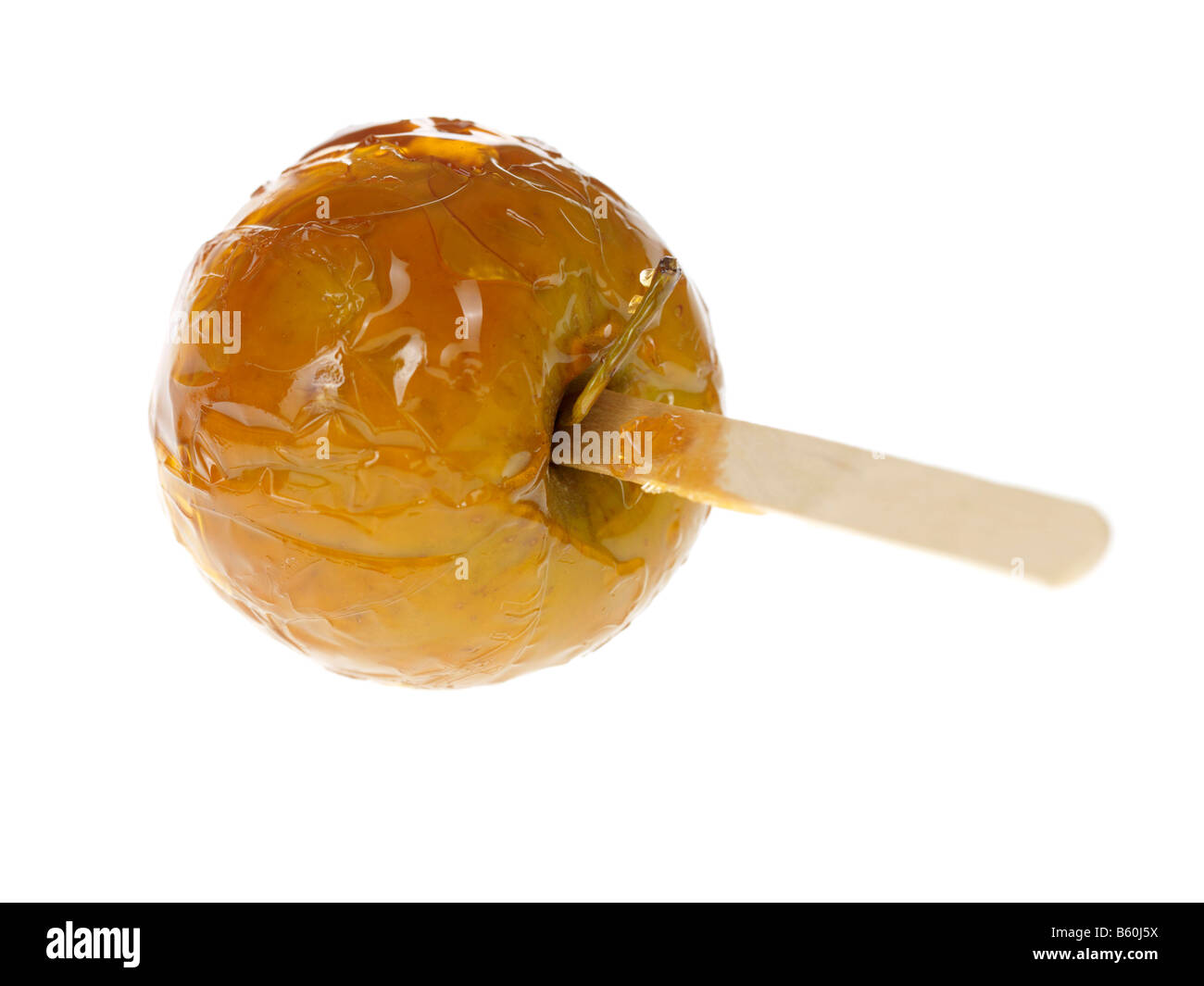 Fresh Crunchy Sticky Toffee Apples On Wooden Sticks Isolated Against A ...