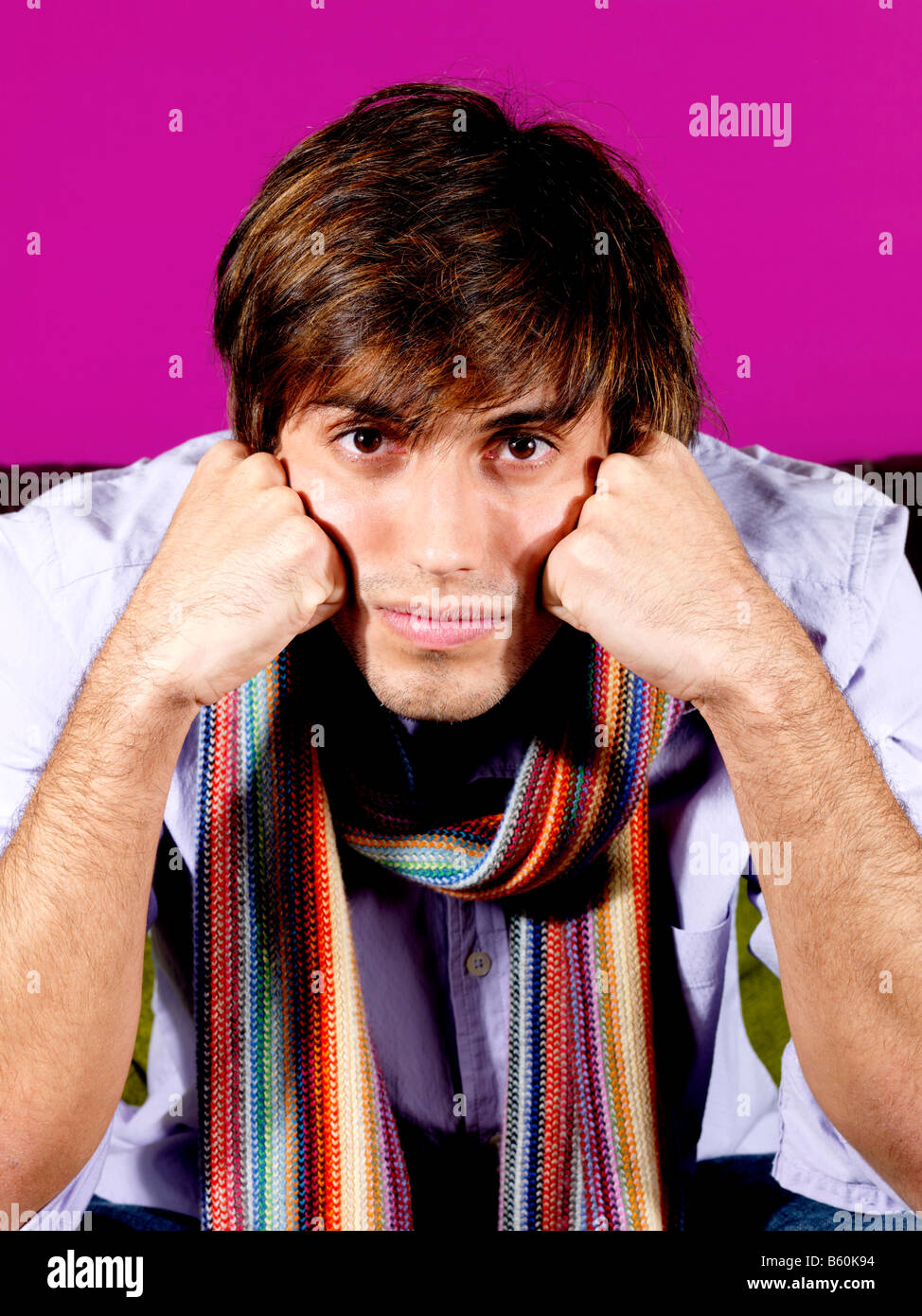 Bored Young Man Wearing A Neck Scarf Model Released Stock Photo - Alamy