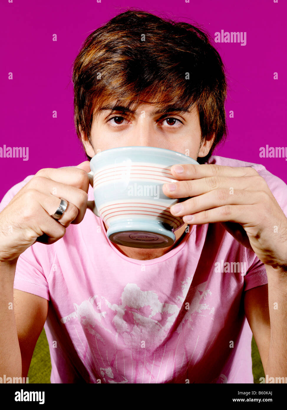 Young Man Drinking Coffee Model Released Stock Photo - Alamy