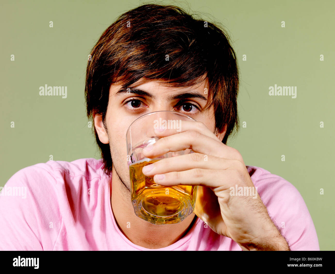 Young Man Drinking Beer Model Released Stock Photo - Alamy