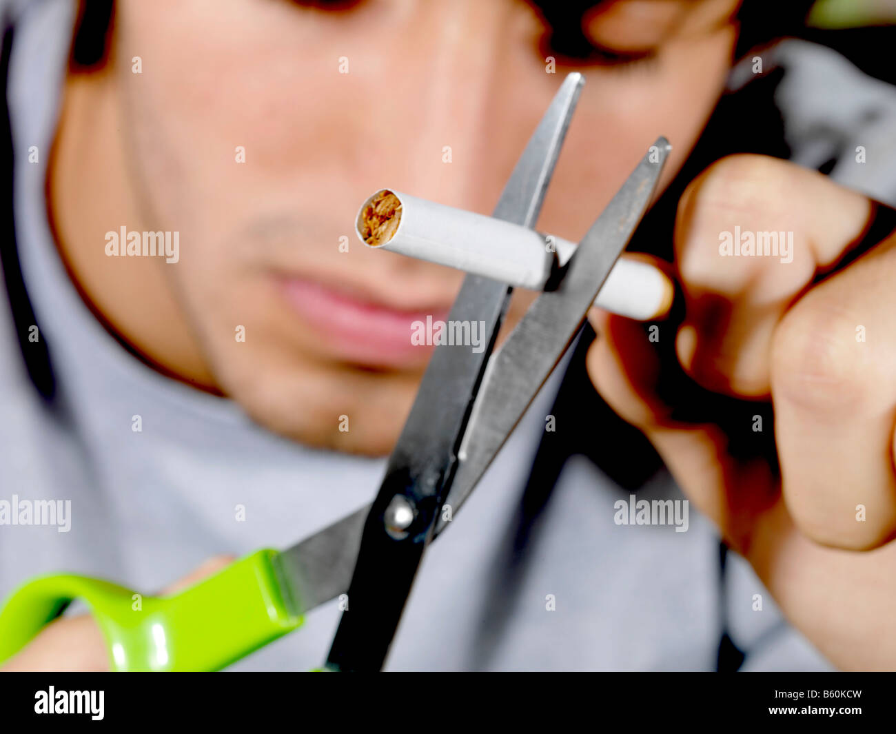 Young man giving up smoking hi-res stock photography and images - Alamy