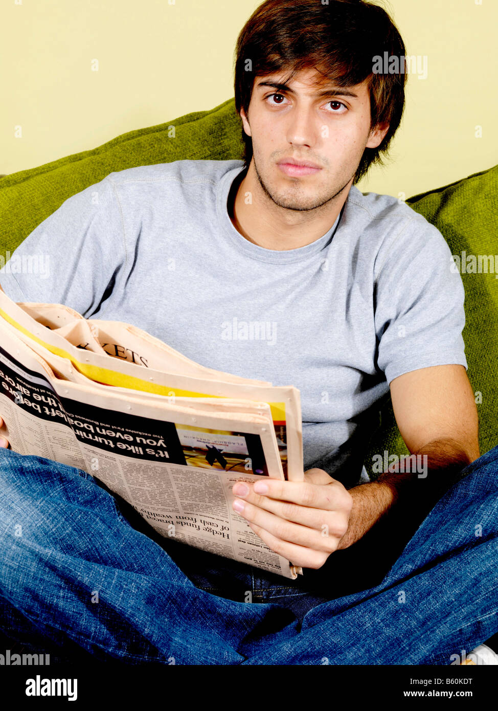 Young Man Reading Newspaper Model Released Stock Photo - Alamy