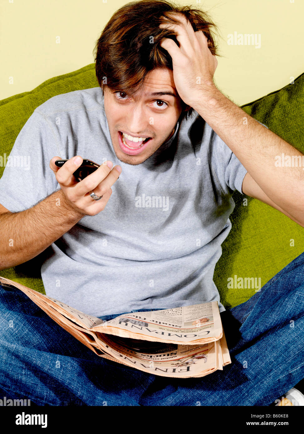 Frustrated Young Man Using Mobile Telephone Model Released Stock Photo ...
