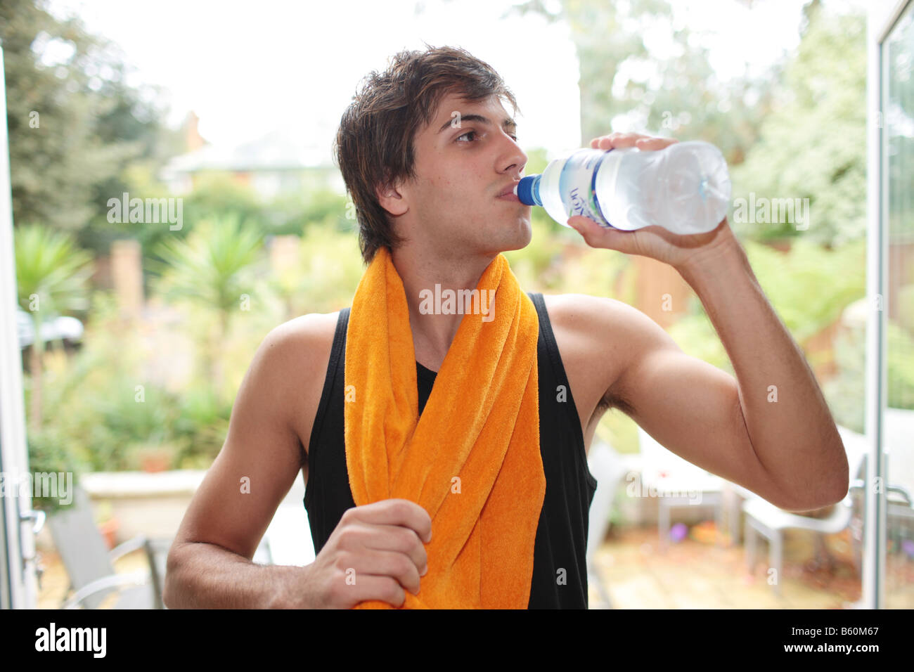 Healthy Young Man Drinking Water Model Released Stock Photo - Alamy