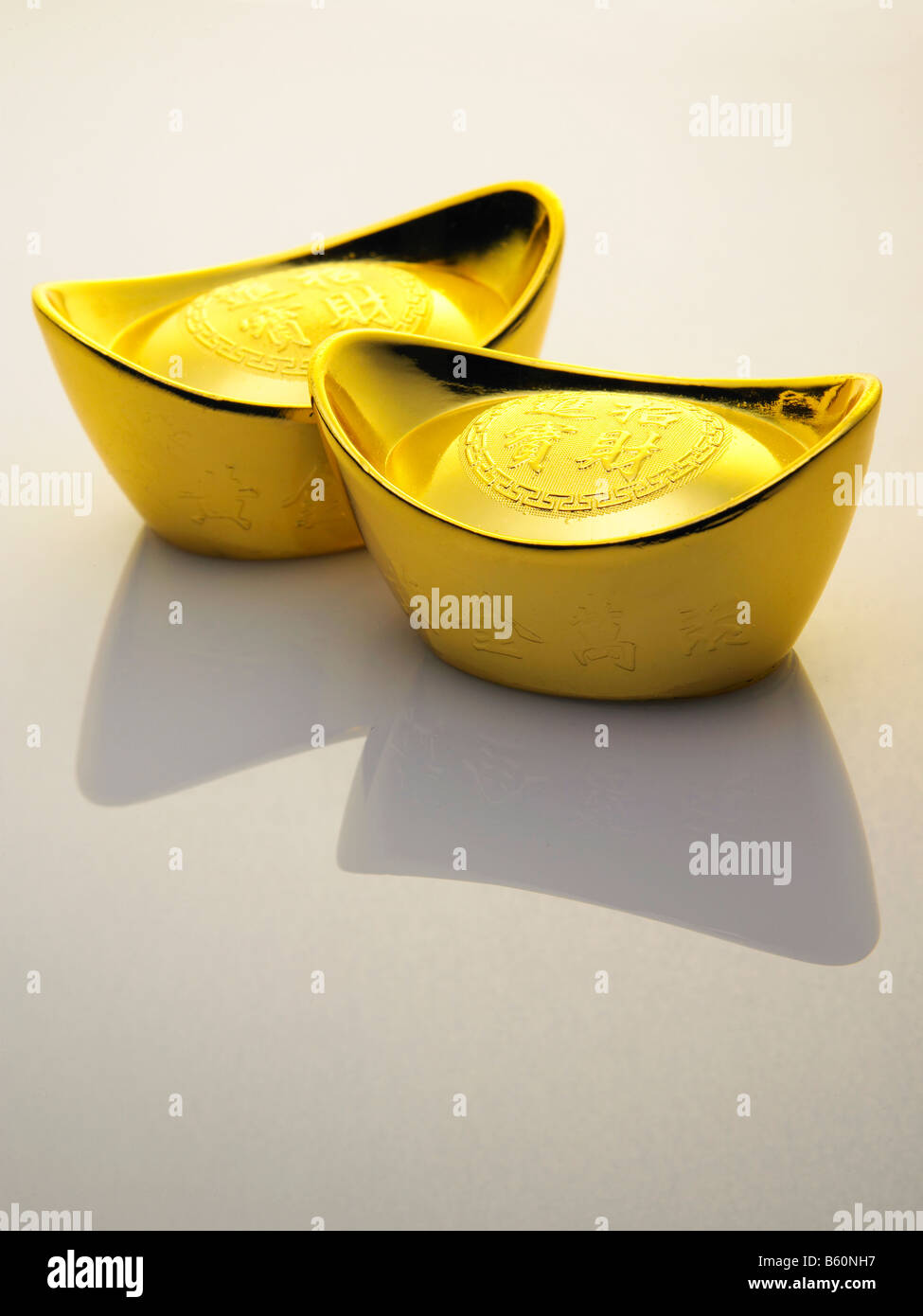 Chinese gold ingots symbol wealth hi-res stock photography and images - Alamy