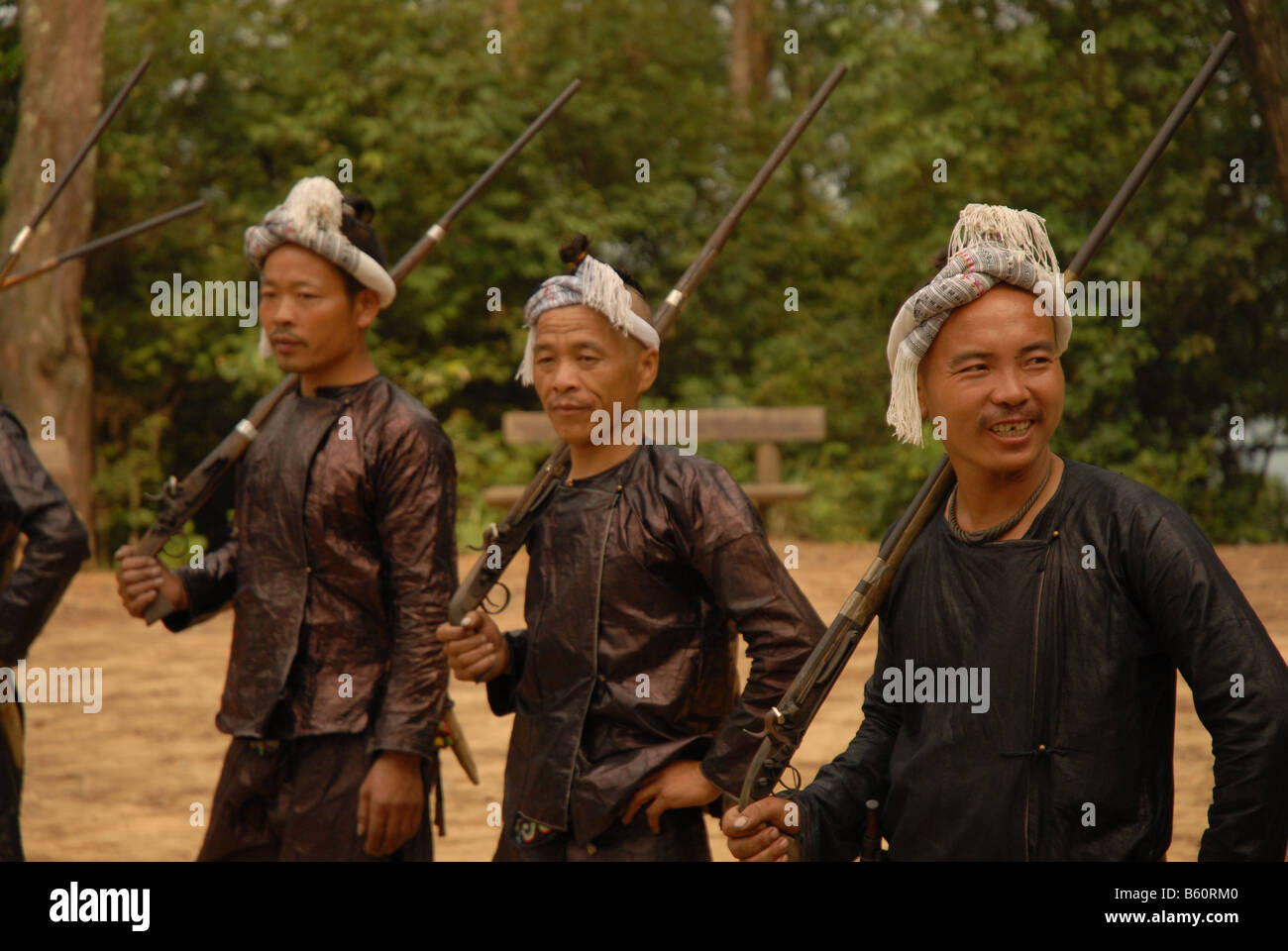 Miao (Hmong) tribal members prepare to perform a ceremony in rural ...