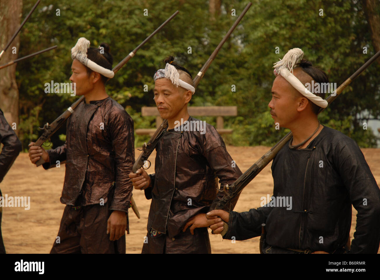 Miao (Hmong) tribal members prepare to perform a ceremony in rural ...