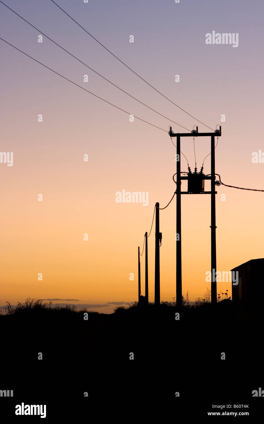 image of power wires and buildings at sunset Stock Photo - Alamy
