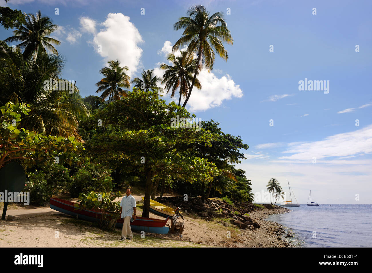 A ST LUCIAN MAN IN THE SHADE BY FORBIDDEN BEACH AT THE JALOUSIE ...