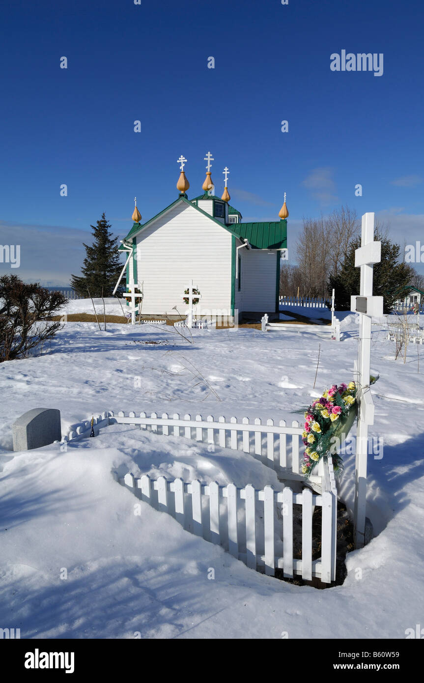 Russian-orthodox church with cemetery in winter in Ninilchik, Kenai ...