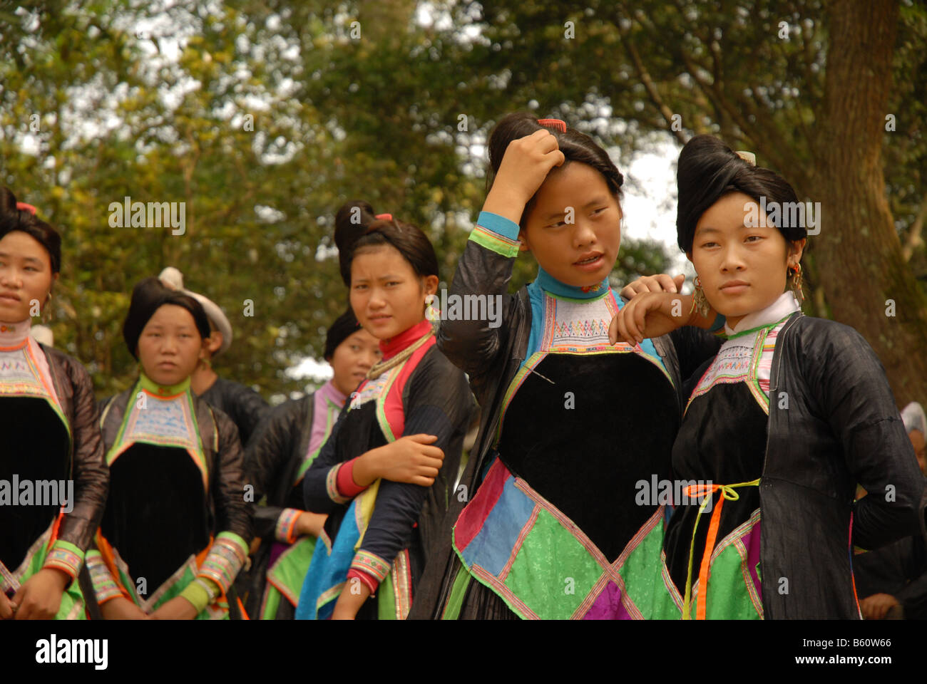 Dancers rest between performances in rural Guizhou Province, China ...