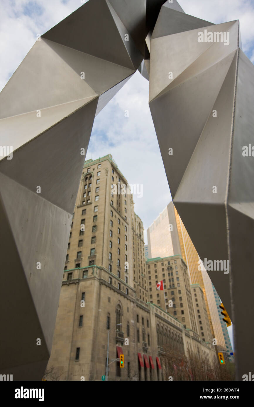 Fairmont Royal York Hotel framed by a sculpture in downtown Toronto ...