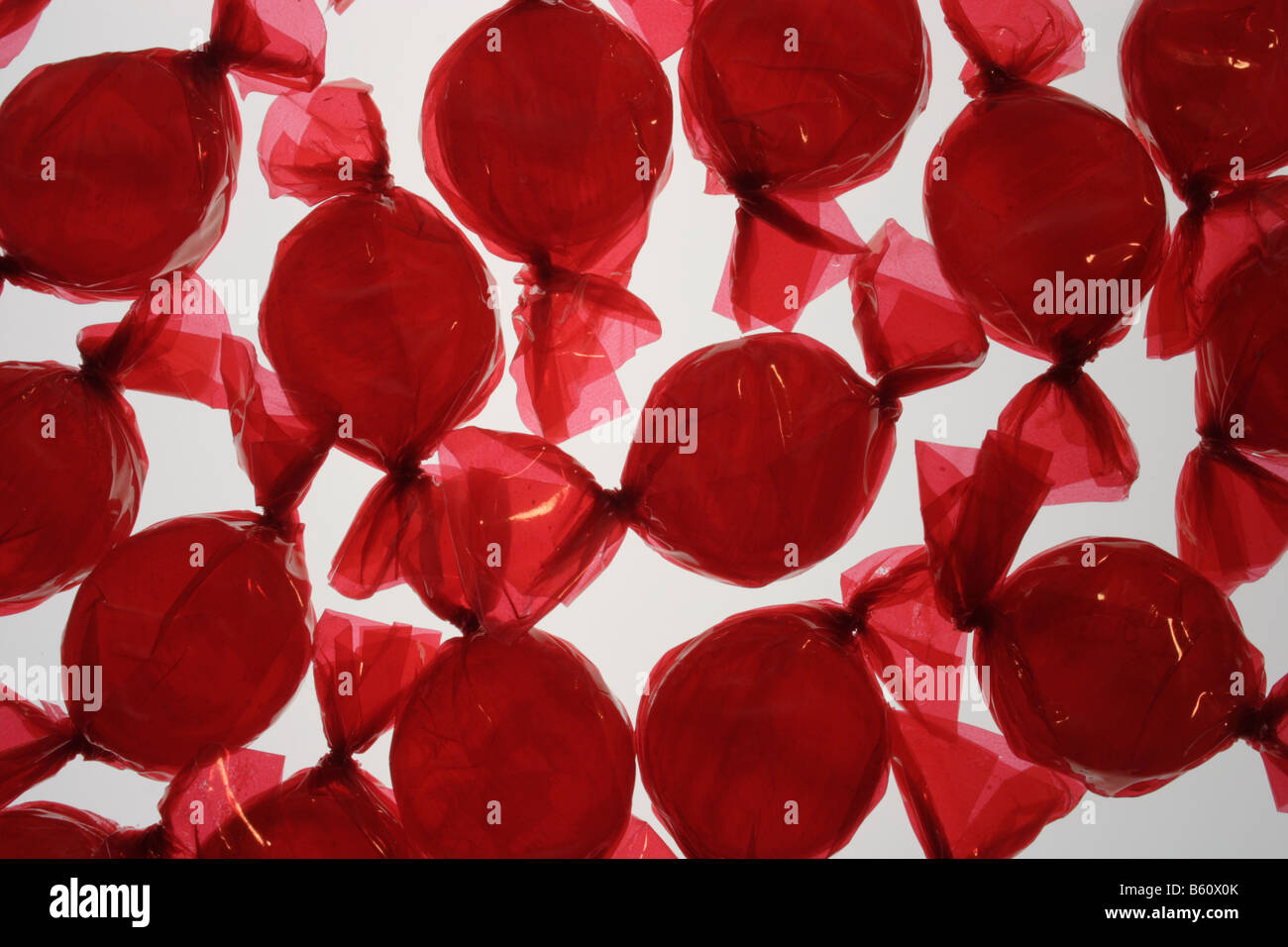 Red Christmas candies Stock Photo - Alamy