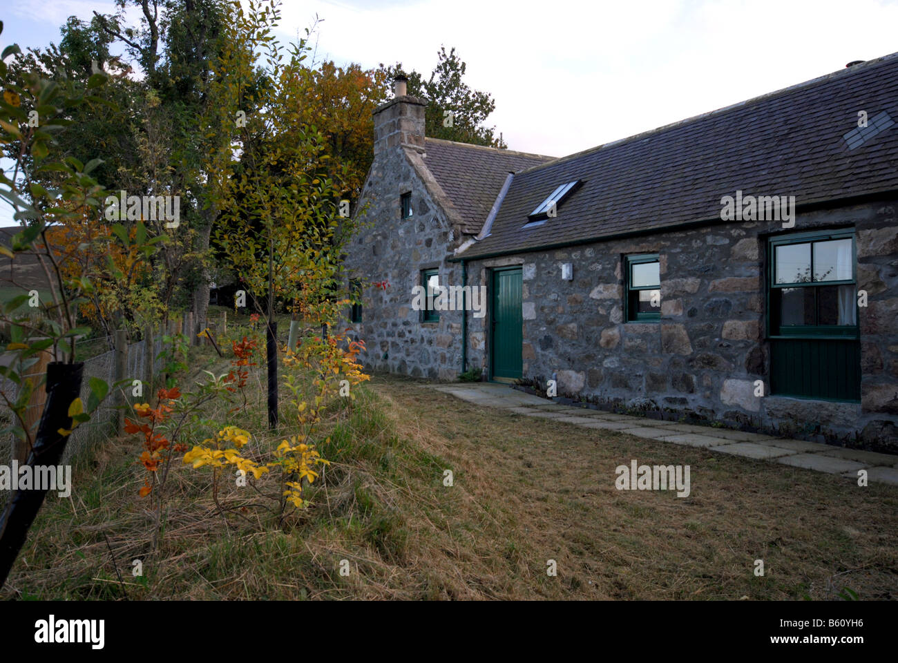 a newly renovated croft in the scottish highlands Stock Photo - Alamy